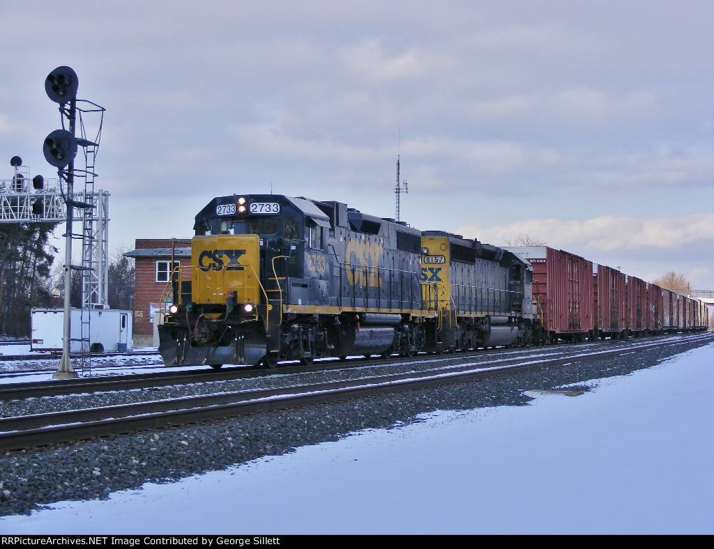 CSX 2733 powers west with a local.